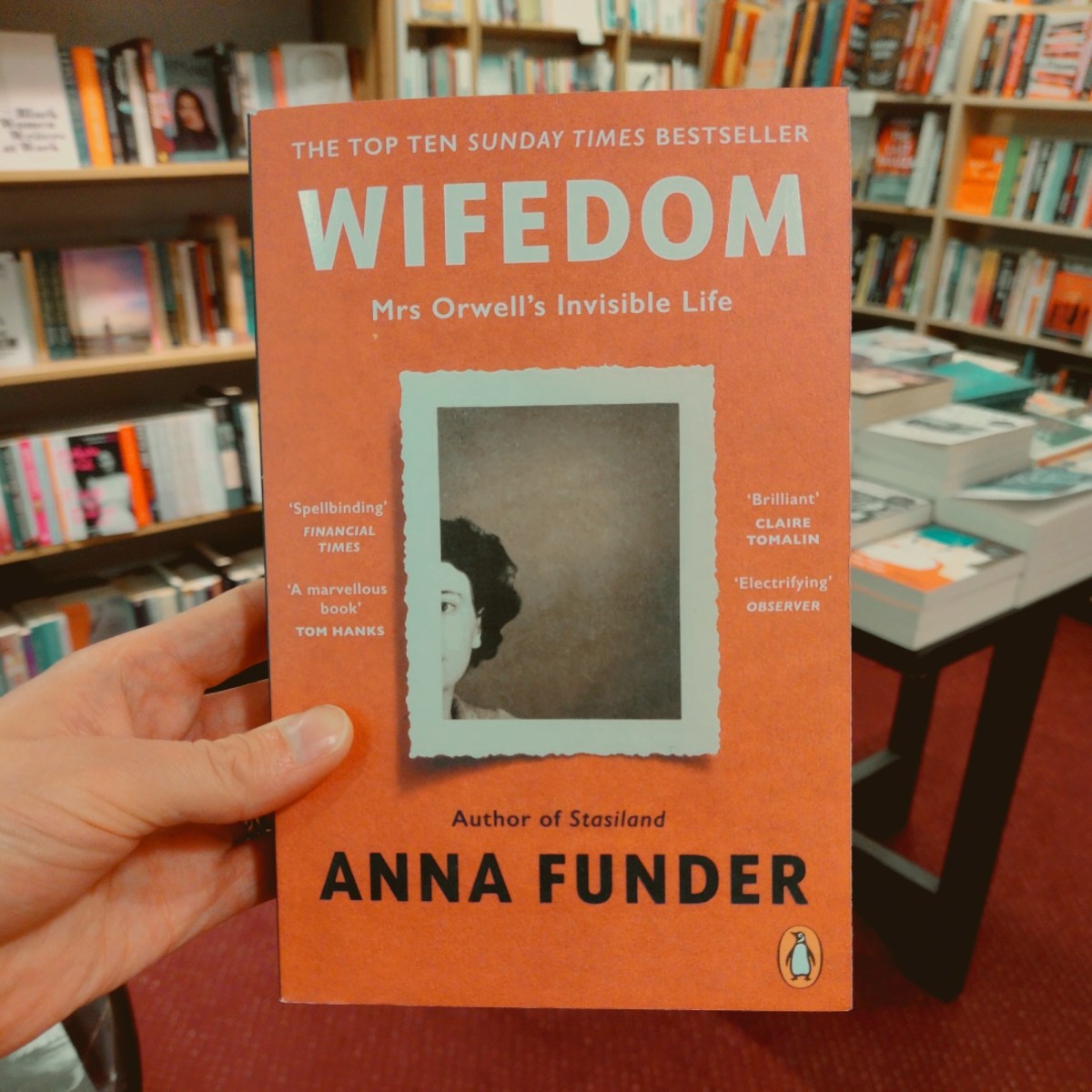 “Wifedom” by Anna Funder – em with pen